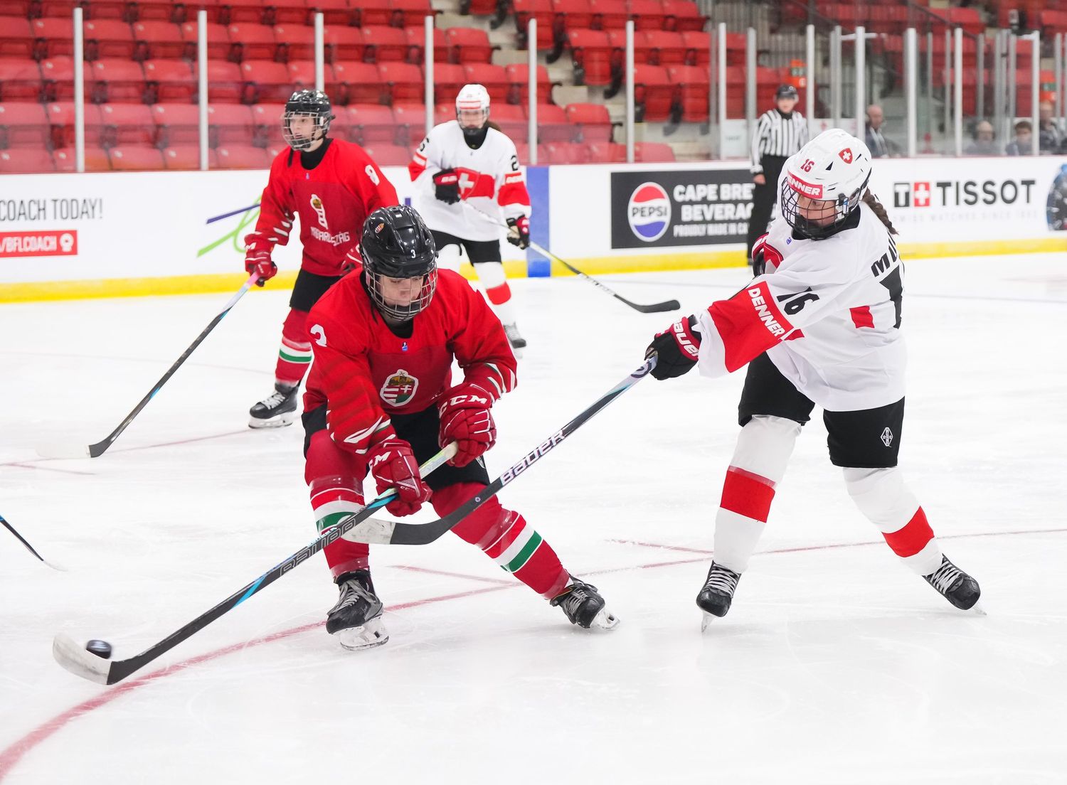 IIHF - Swiss win critical final game